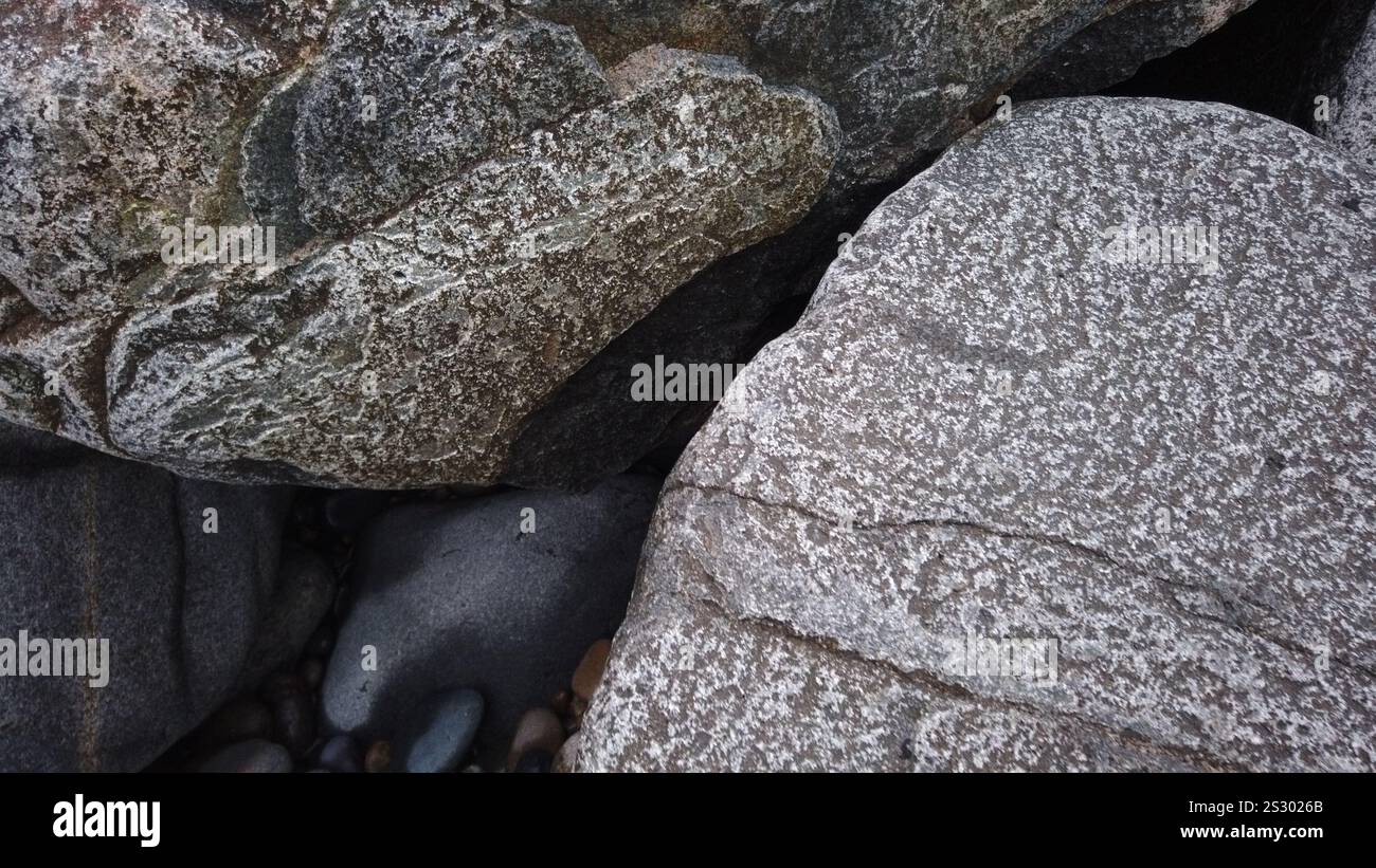 The cool Melted Rocks of Swamis Beach. Erosion control boulders placed ...