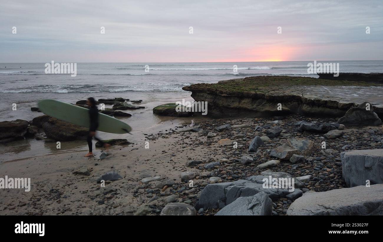 The cool Melted Rocks of Swamis Beach. Erosion control boulders placed ...