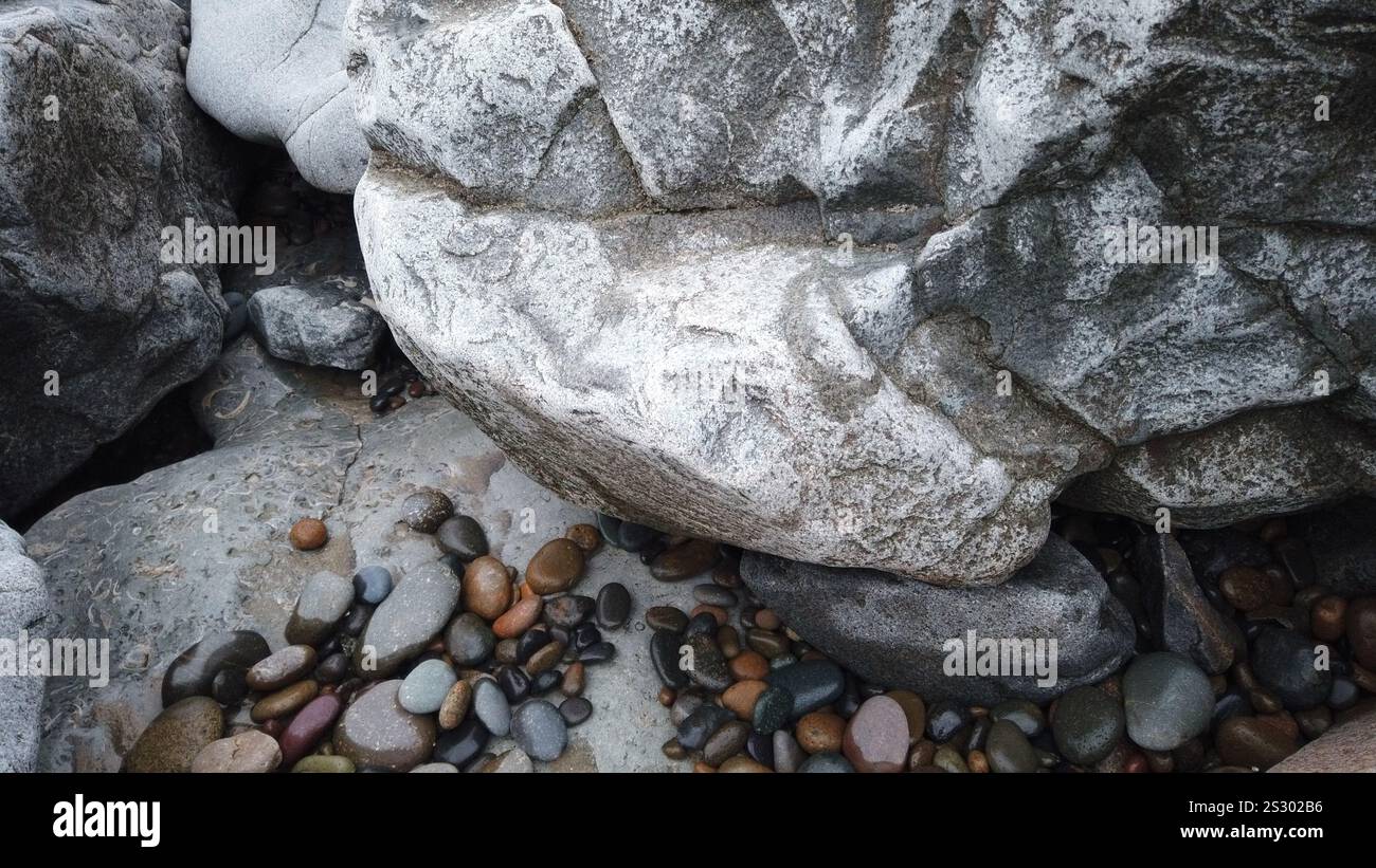 The cool Melted Rocks of Swamis Beach. Erosion control boulders placed ...