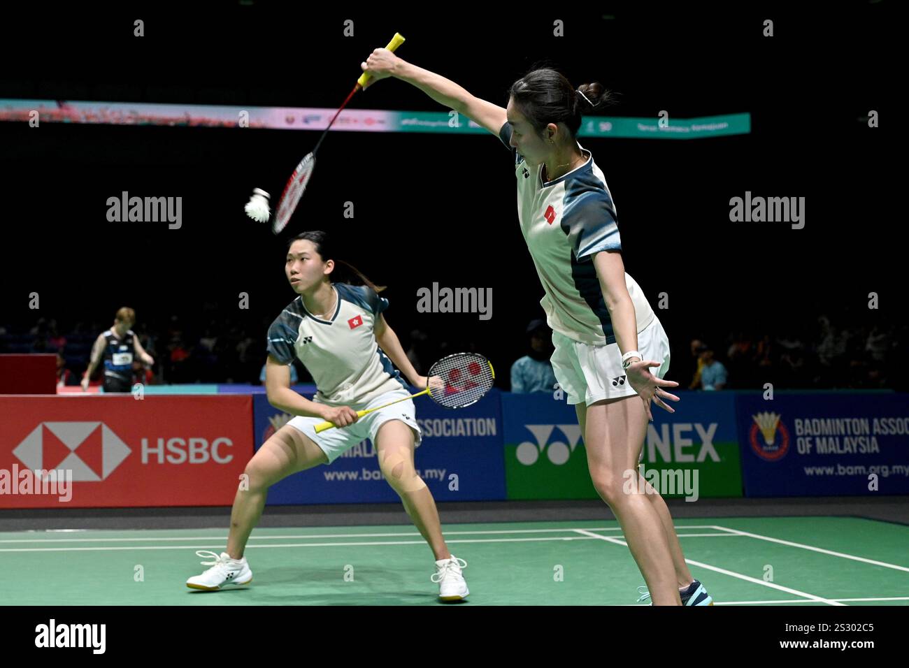 KUALA LUMPUR, Jan. 8, 2025 (Xinhua) -- Fan Ka Yan (R)/Yau Mau Ying ...