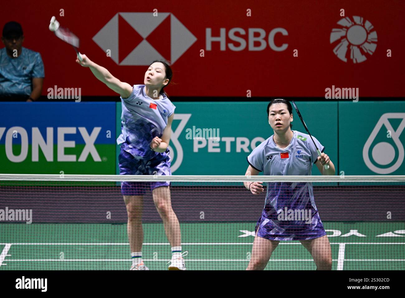 KUALA LUMPUR, Jan. 8, 2025 (Xinhua) -- Li Yijing (L)/Luo Xumin compete during the women's ...