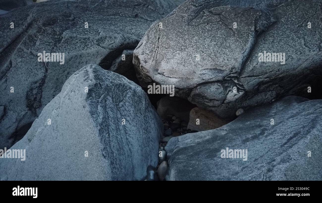 The cool Melted Rocks of Swamis Beach. Erosion control boulders placed ...