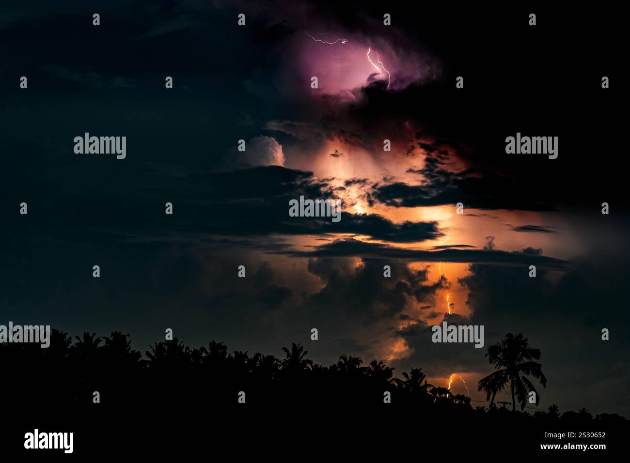 Thundering and Lightning Striking Through the Night Rainy Sky in a ...