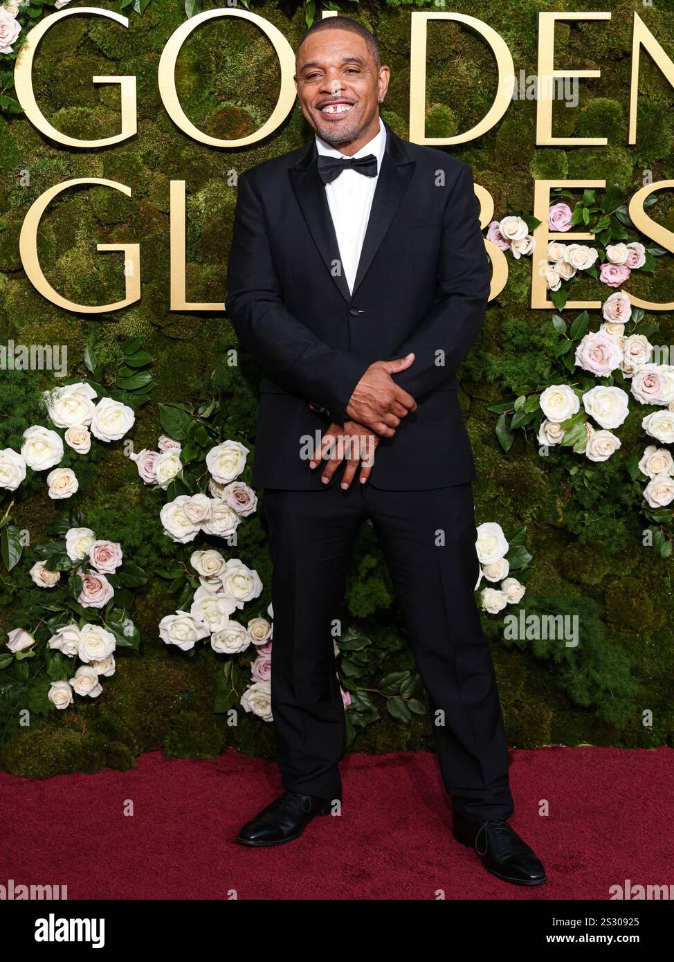 BEVERLY HILLS, LOS ANGELES, CALIFORNIA, USA - JANUARY 05: Clarence Maclin arrives at the 82nd ...