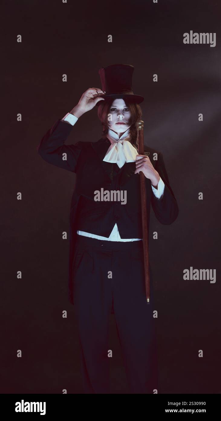 Character in traditional attire stands hi-res stock photography and ...