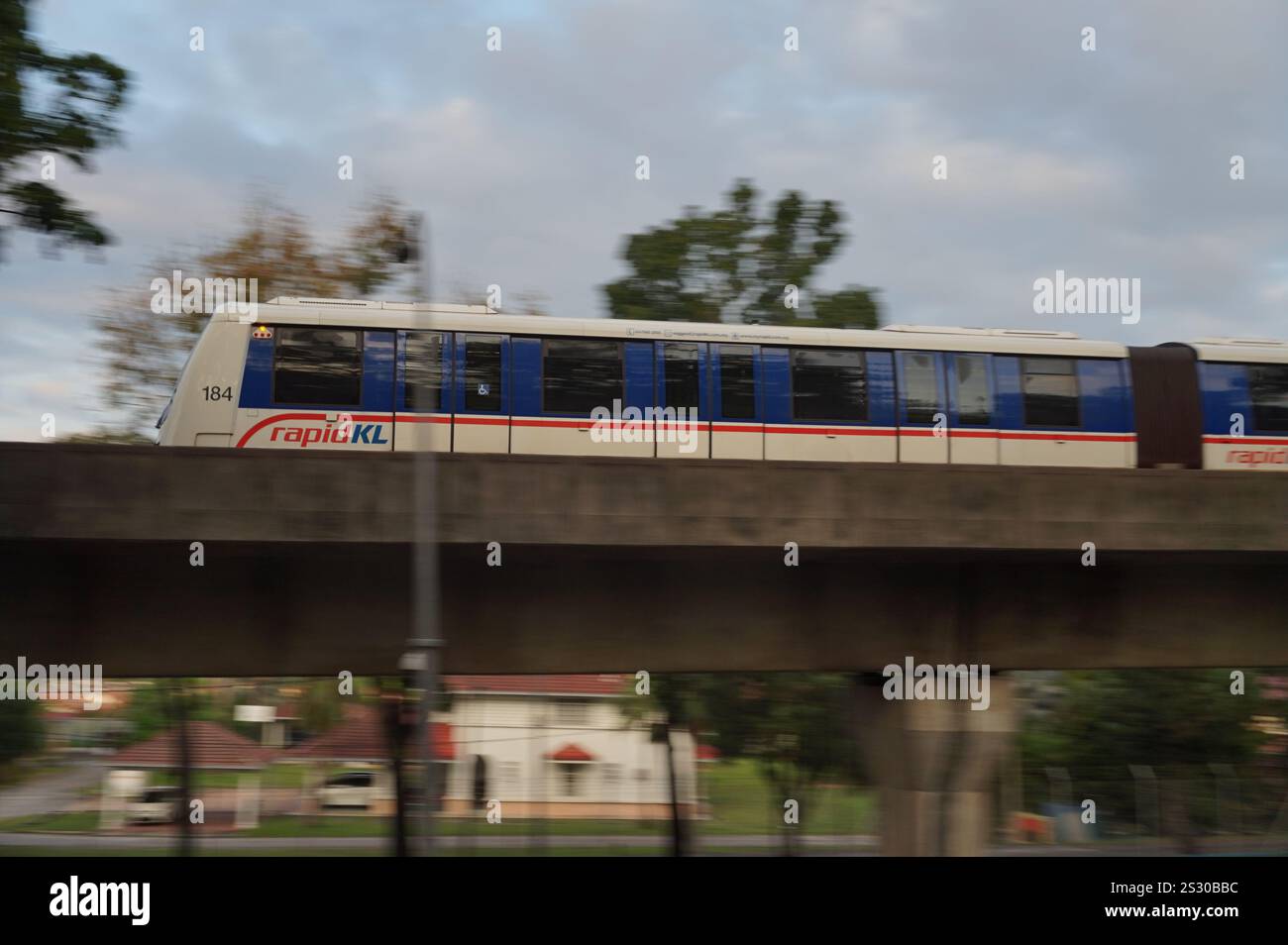 Panning photography of train in Malaysia Stock Photo - Alamy