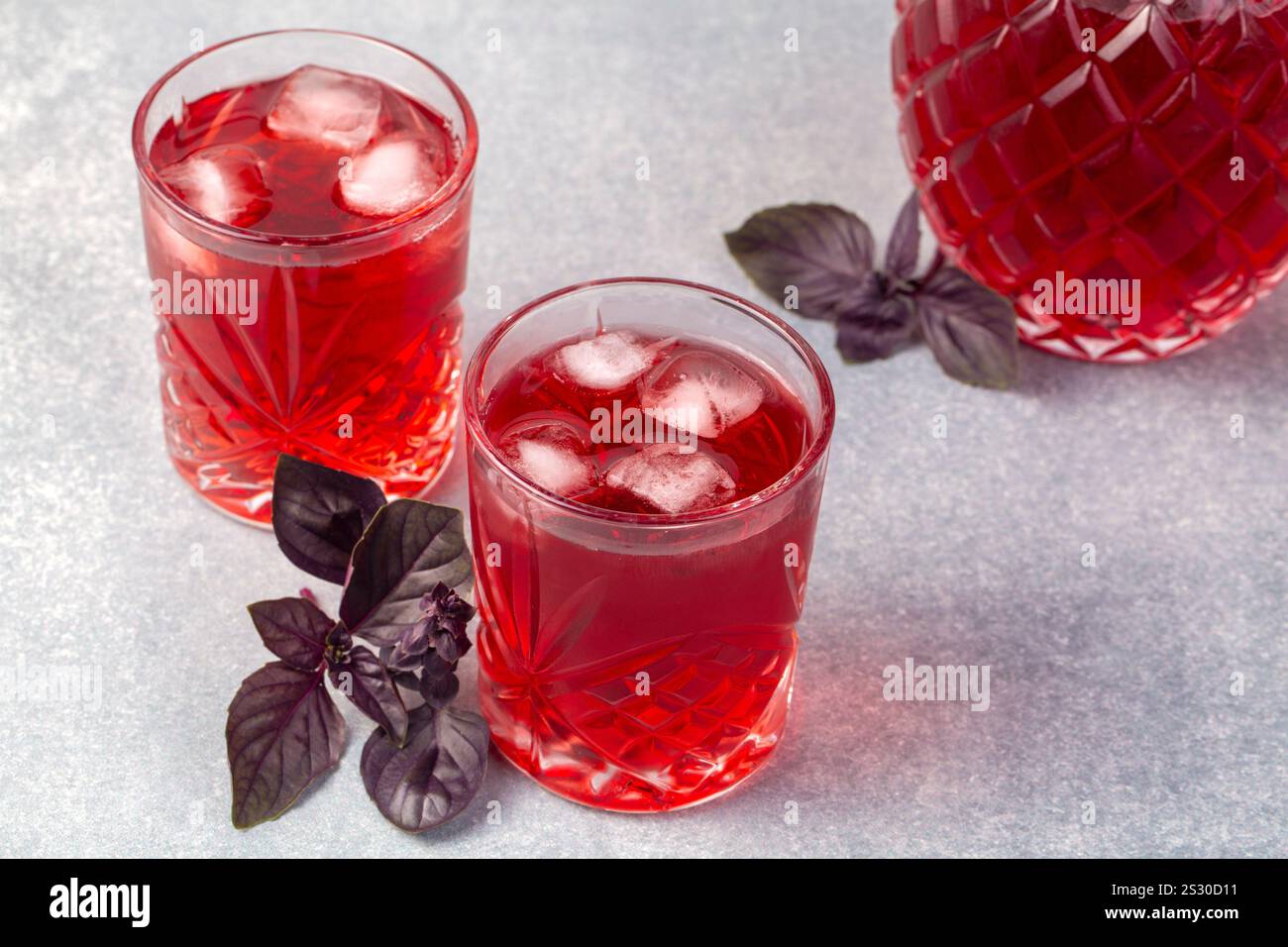 Glass of purple basil sherbet and purple basil Stock Photo - Alamy