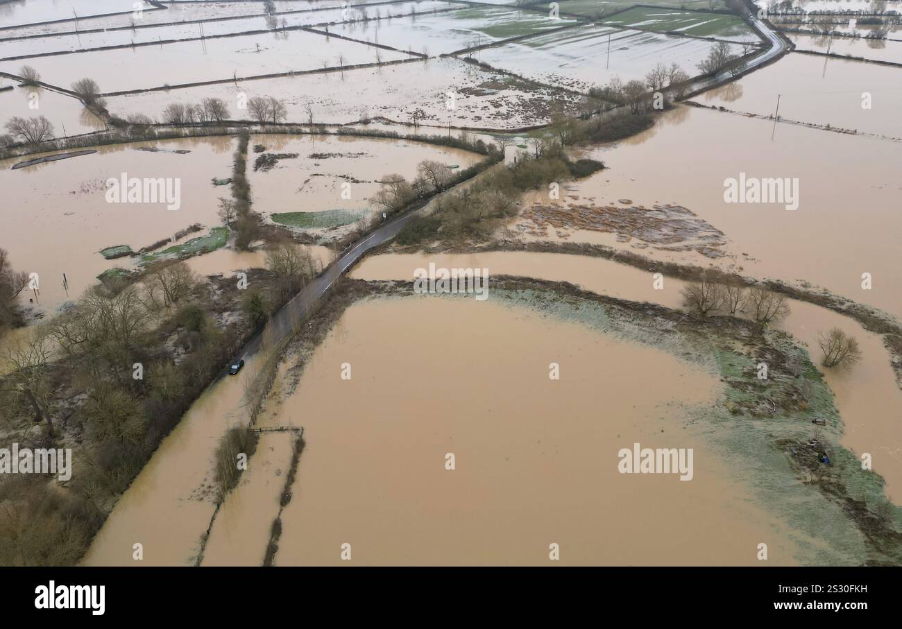 An abandoned car on a flooded road in Mountsorrel in Leicestershire ...