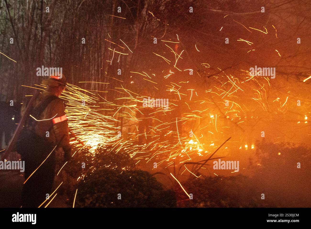 Los Angeles, California, USA. 8th Jan, 2025. Firefighters battle the ...