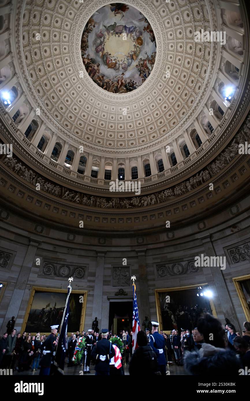 The flag draped casket of the late former President Jimmy Carter lies ...