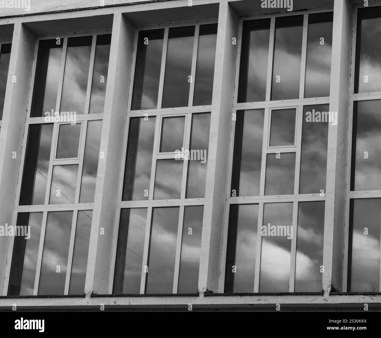 Windows Reflecting Sky with clouds Stock Photo - Alamy