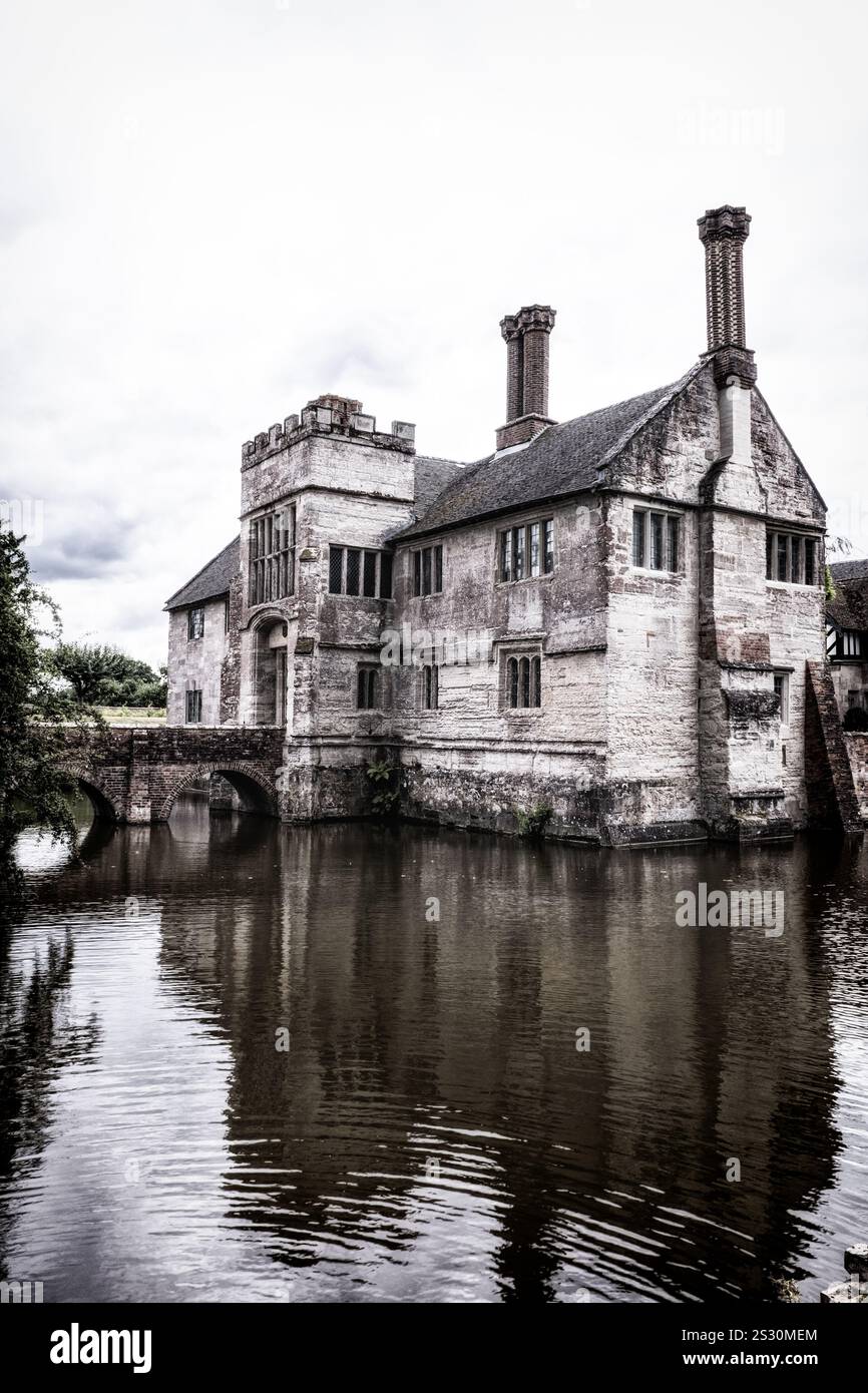 Medieval English gated moated manor house in, Warwickshire, England ...