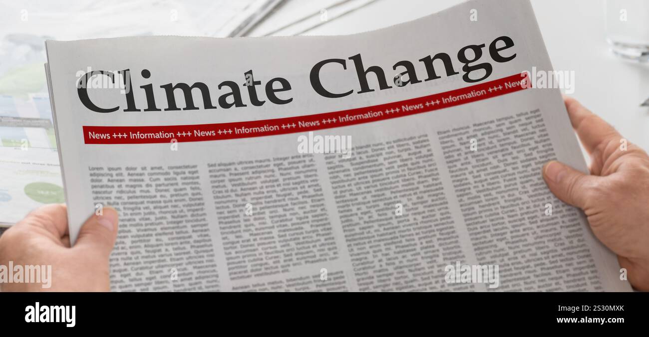 Newspaper with the headline Climate change Stock Photo - Alamy