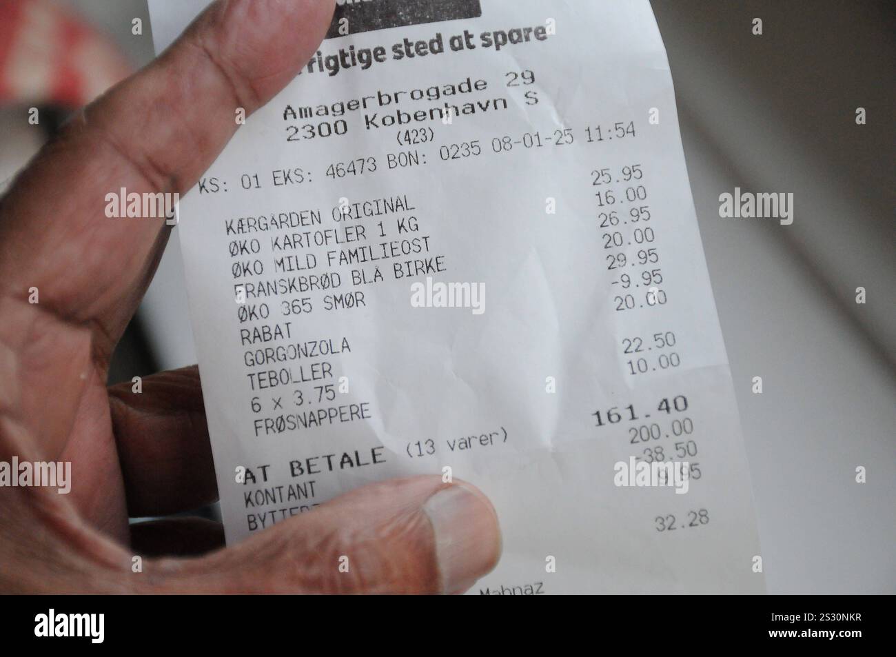 Copenhagen, Denmark/08 JANUARY 2025/Grocery and receipt for grocery ...
