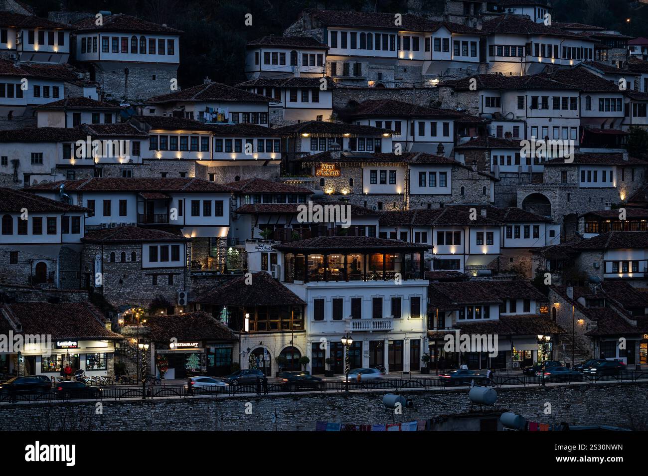 Traditional house facades on the hills of the village of Berat, Albania ...