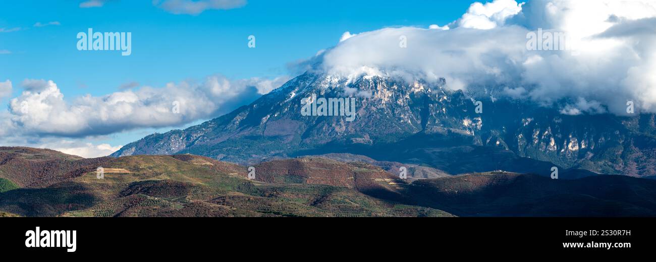 Snow topped mountains and green hills around Berat, Albania Stock Photo ...