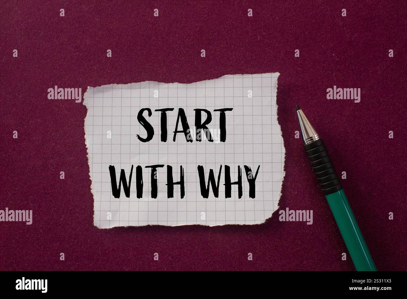 Start with why message written on ripped torn paper piece with purple background. Conceptual ...