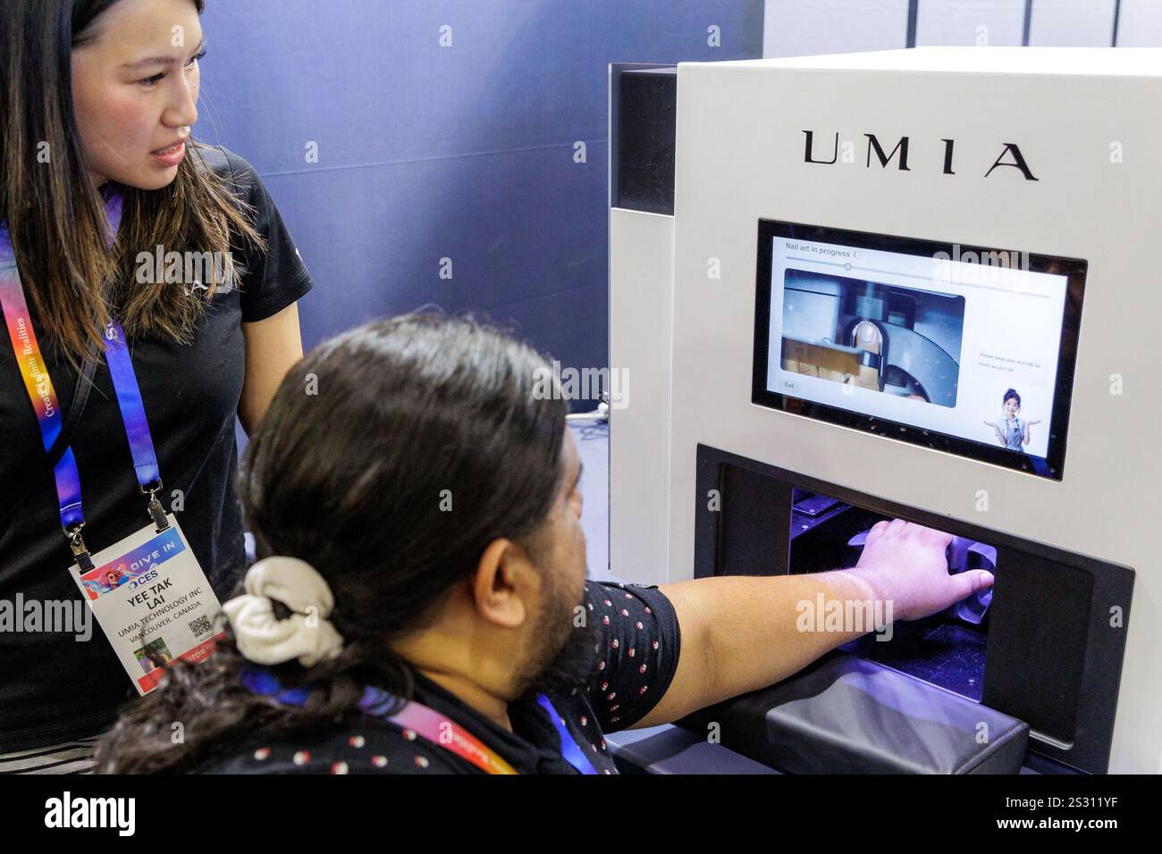 A smart nail art machine, by Umia, on display during CES 2025 at the ...