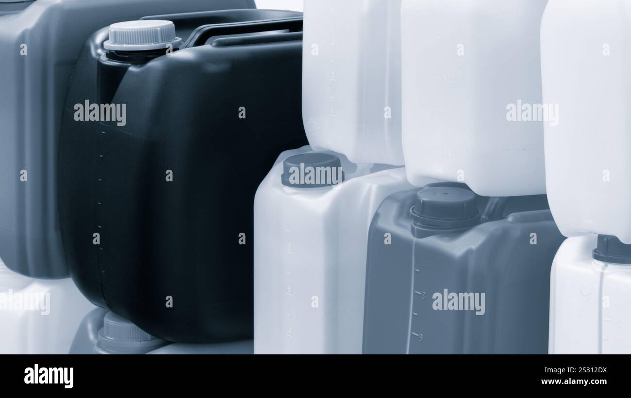 Multicolored plastic jerry can containers Stock Photo - Alamy