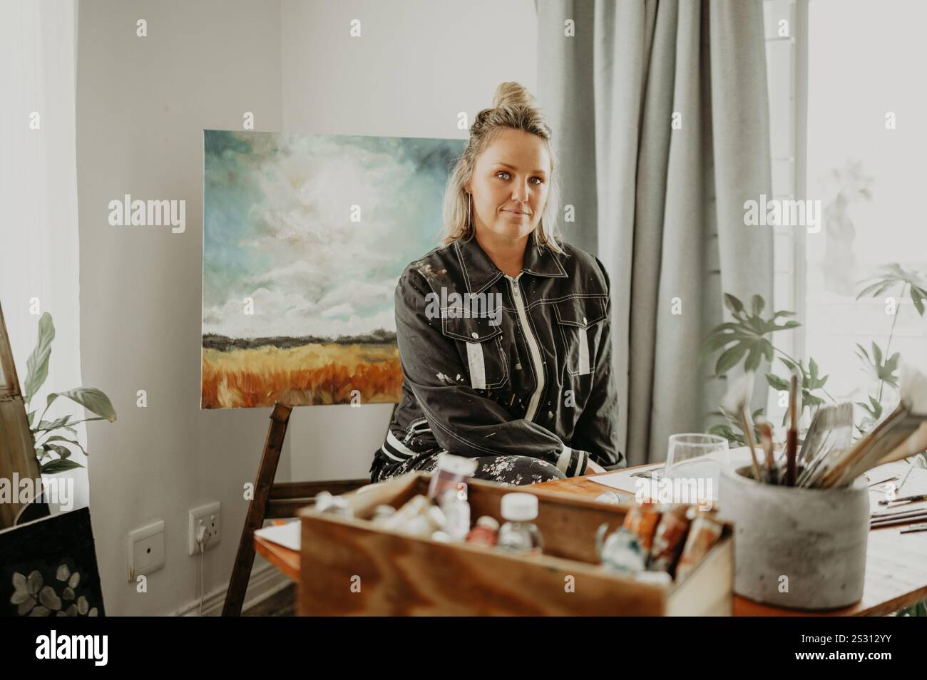 Creative, landscape painting and portrait of woman in studio for ...
