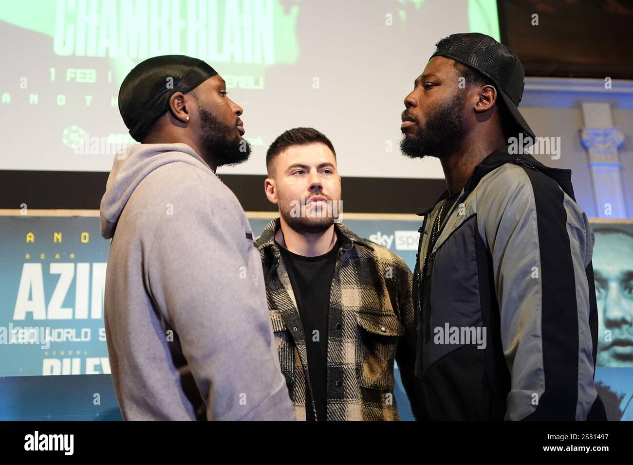 Boxers Viddal Riley (left) and Isaac Chamberlain with boxing promotor ...