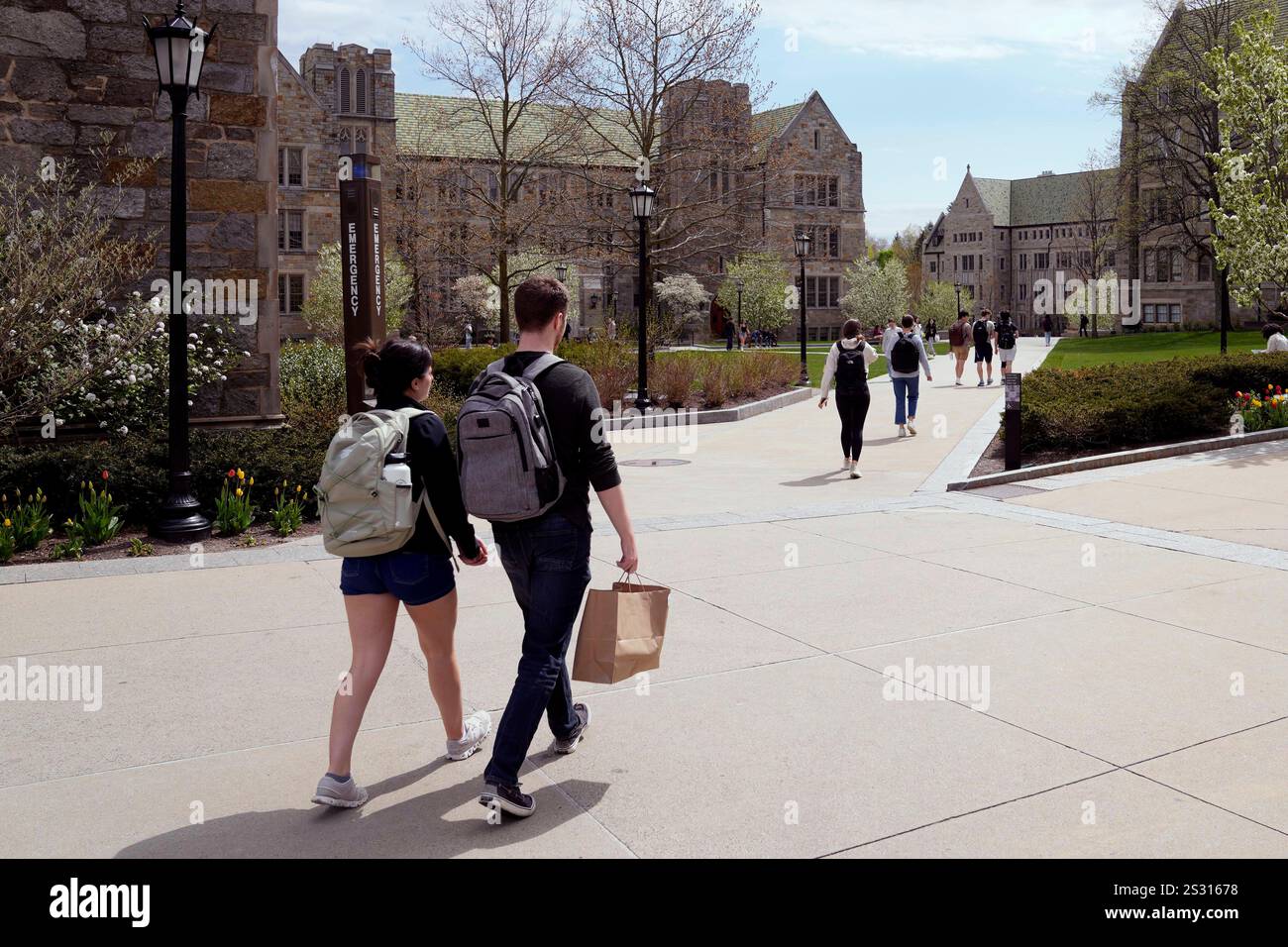 FILE - Students walk on the campus of Boston College, Monday, April 29 ...