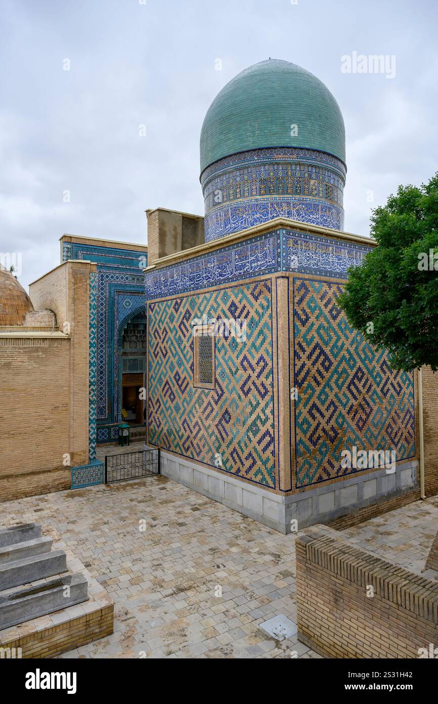 Mausoleum with a dome, Arabic script and traditional Uzbek ornament in ...