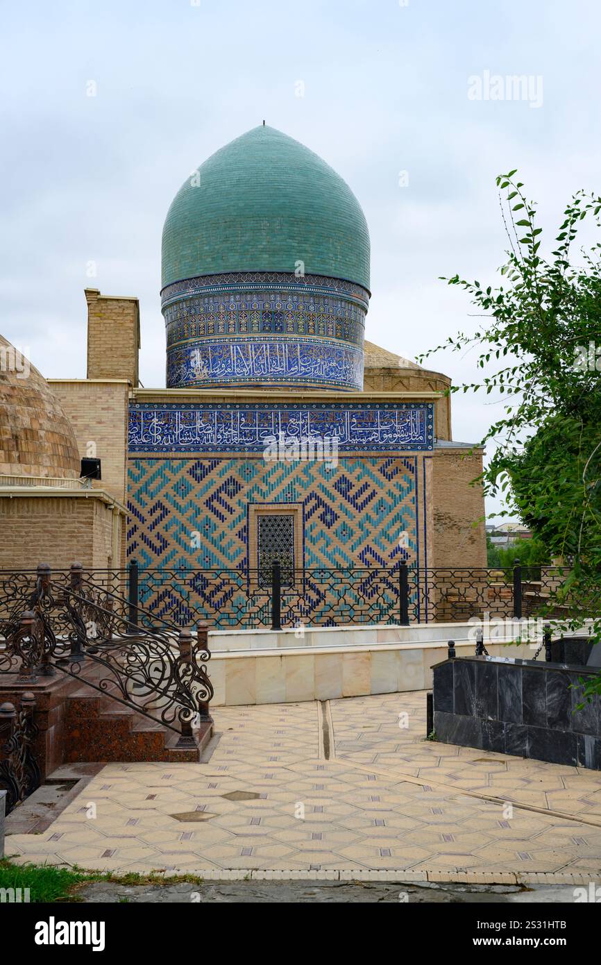 Mausoleum with a dome, Arabic script and traditional Uzbek ornament in ...