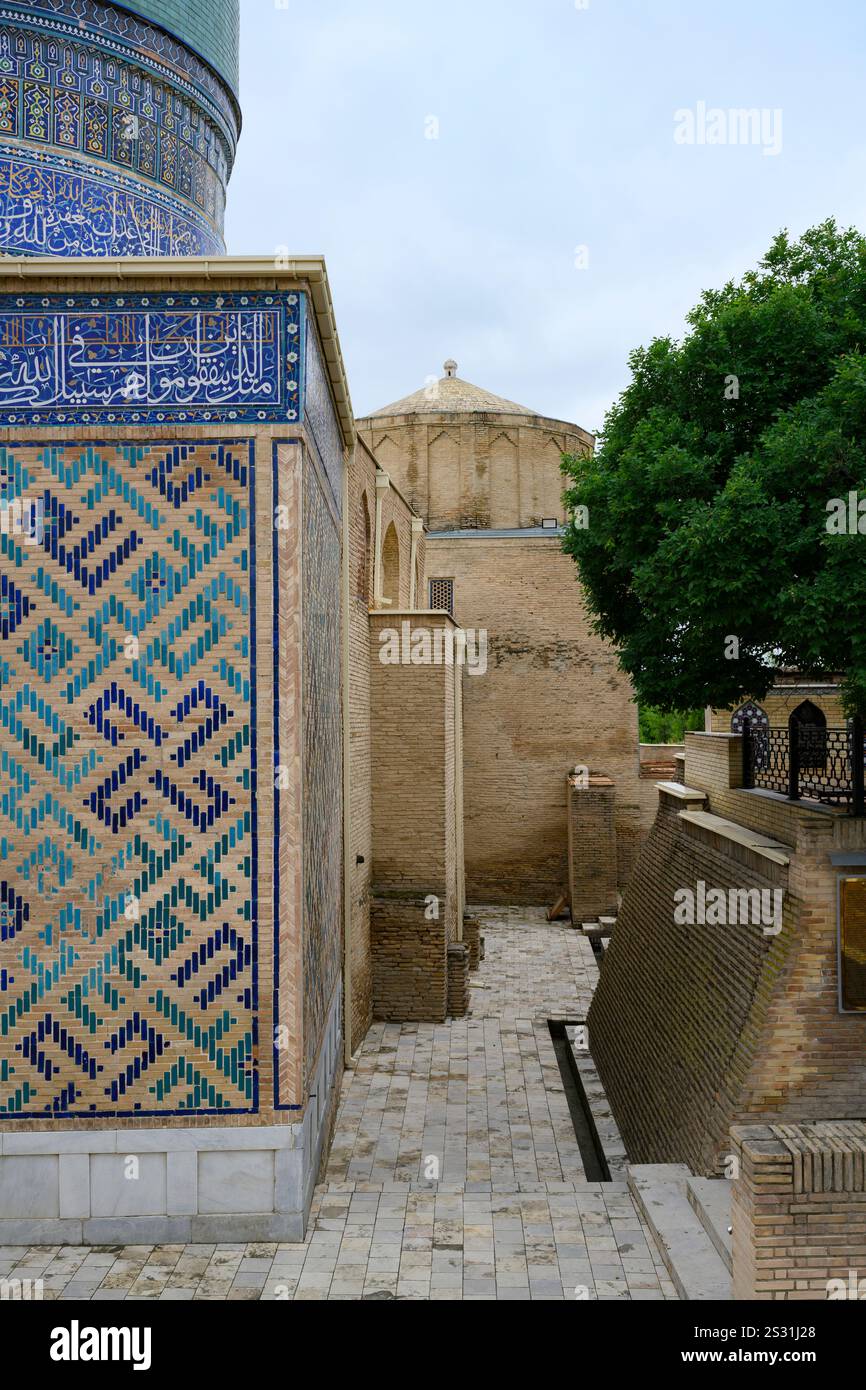 Mausoleum with a dome, Arabic script and traditional Uzbek ornament in ...