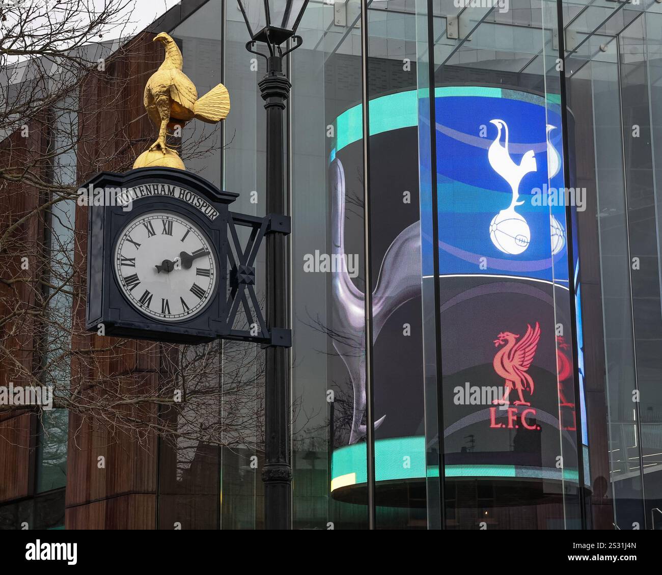 Tottenham Hotspur clock with Tottenham vs Liverpool band er on the LCD ...