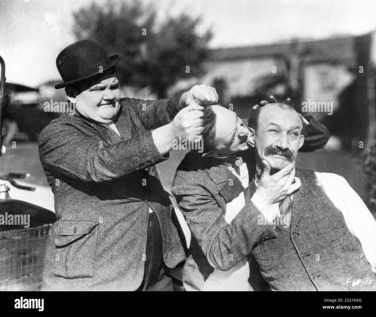 BIG BUSINESS OLIVER HARDY, STAN LAUREL, JIMMY FINLAY Date: 1929 Stock ...