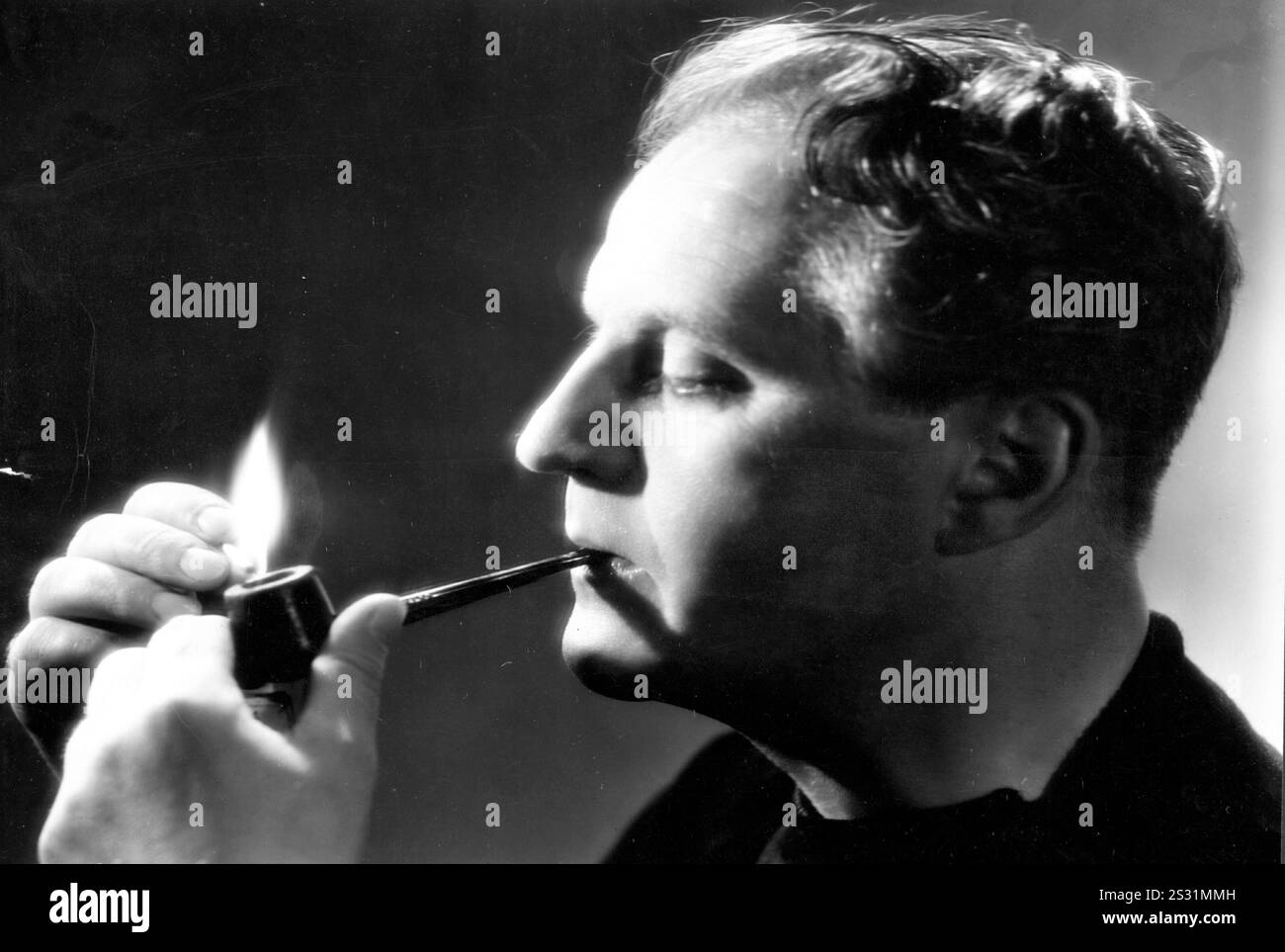 DAY BREAK ERIC PORTMAN PIPE LIGHTING COPYRIGHT: RANK FILMS/CARLTON ...