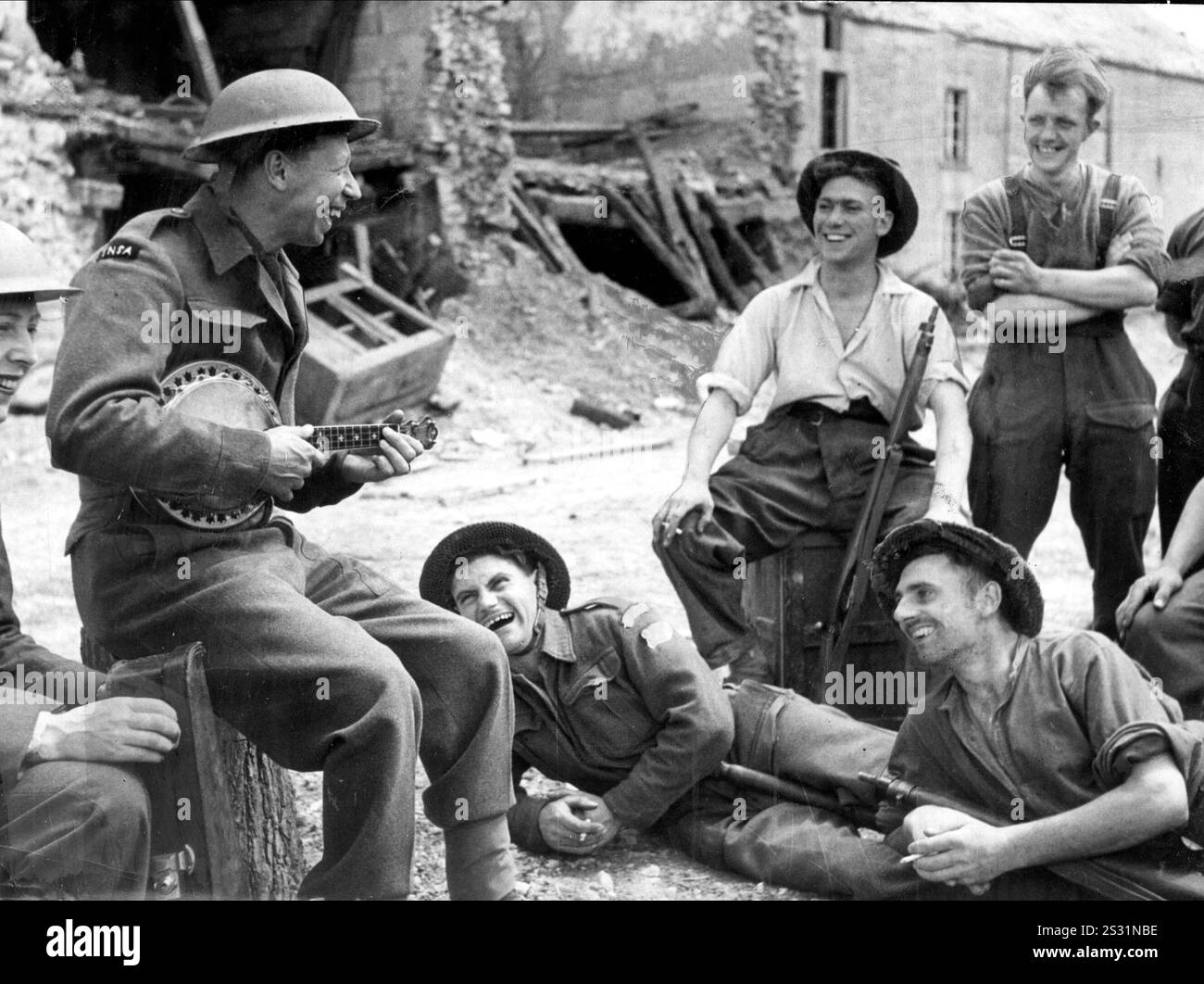 GEORGE FORMBY IN NORMANDY Date: 1944 Stock Photo - Alamy