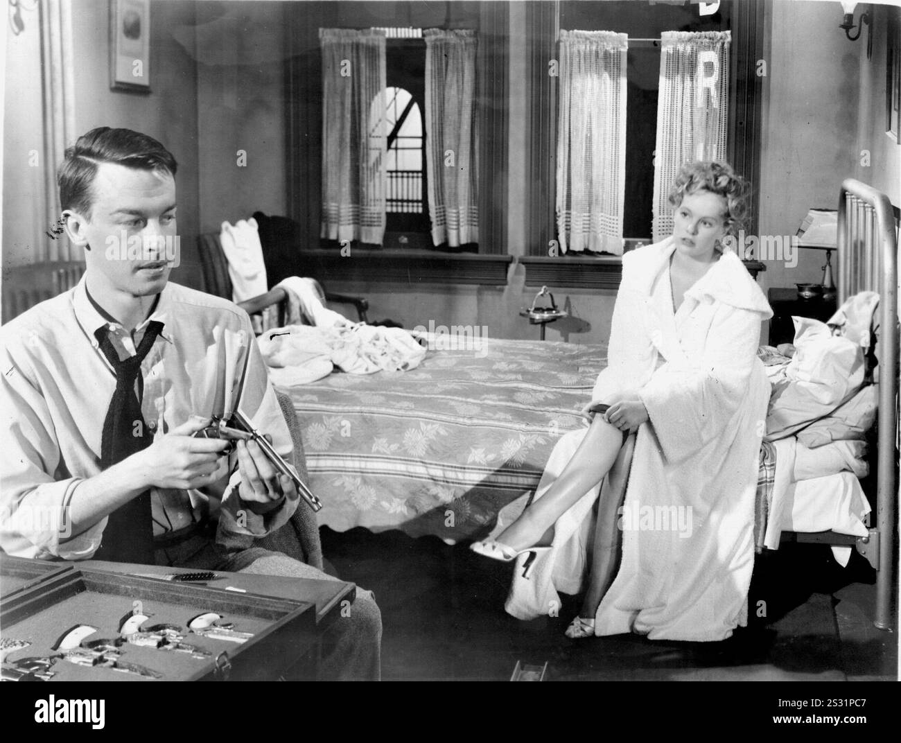 GUN CRAZY JOHN DALL, PEGGY CUMMINS Date: 1949 Stock Photo - Alamy