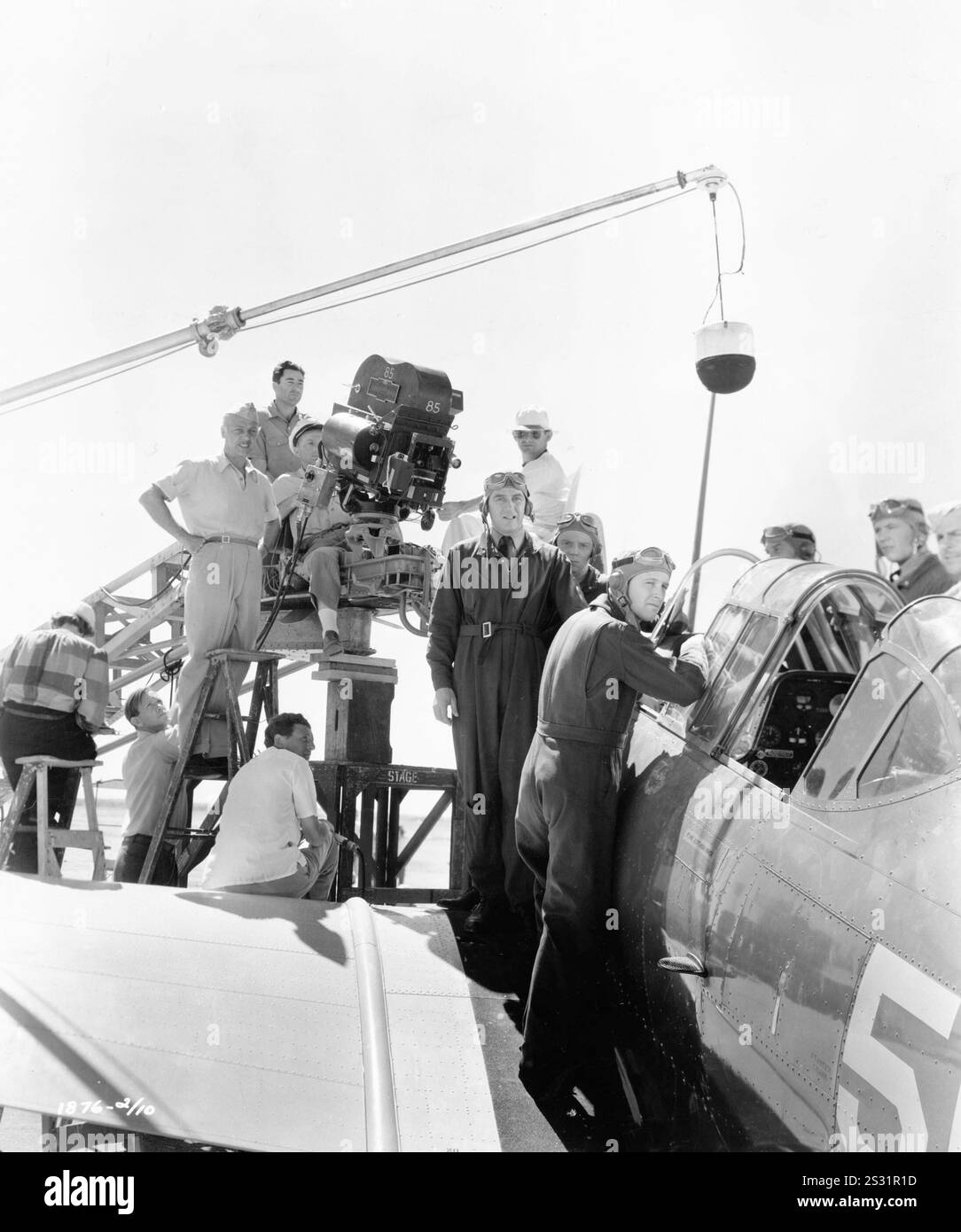 I WANTED WINGS DIRECTOR, MITCHELL LEISEN, STANDING ON STEP LADDER, WITH ...