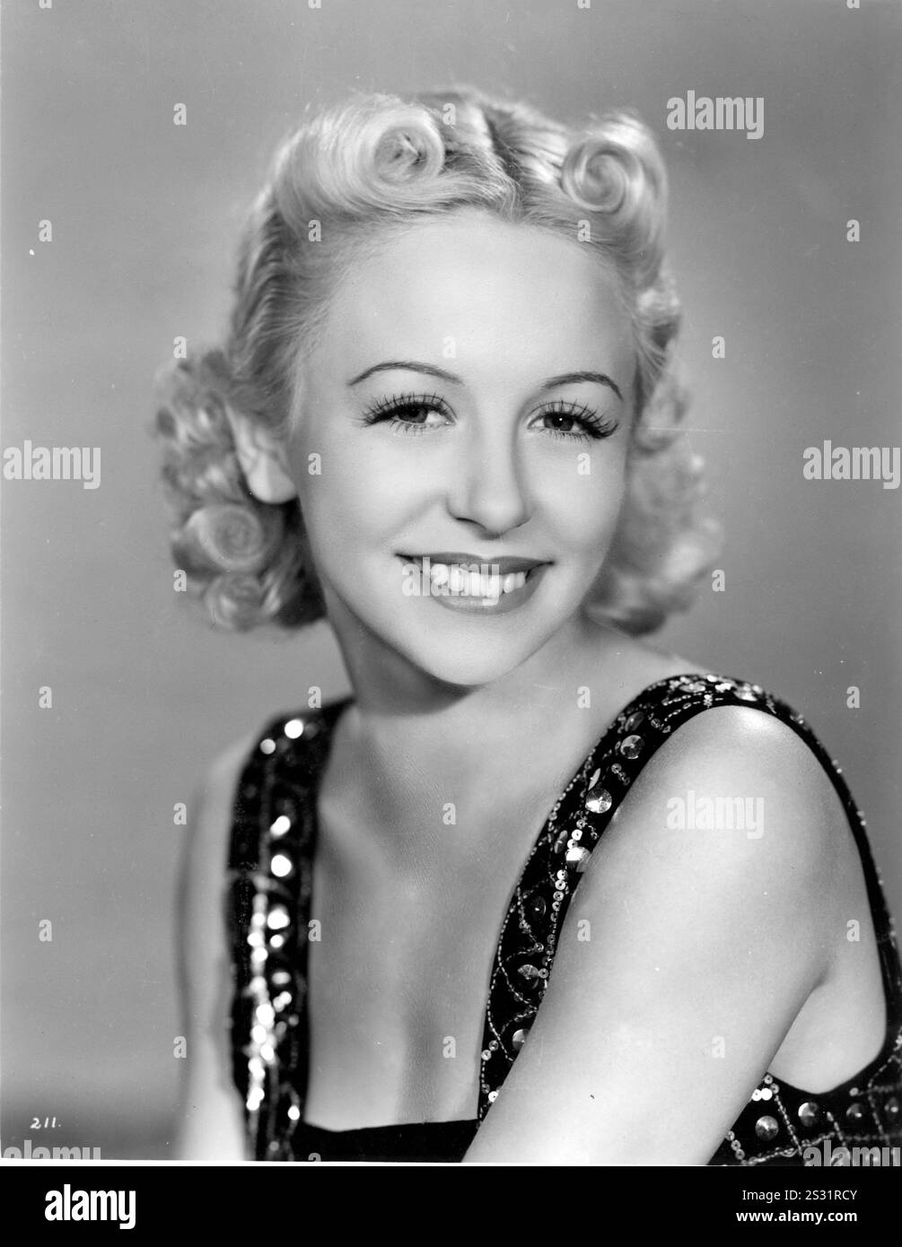 KICKING THE MOON AROUND VOGUE EVELYN HALL Date: 1938 Stock Photo - Alamy