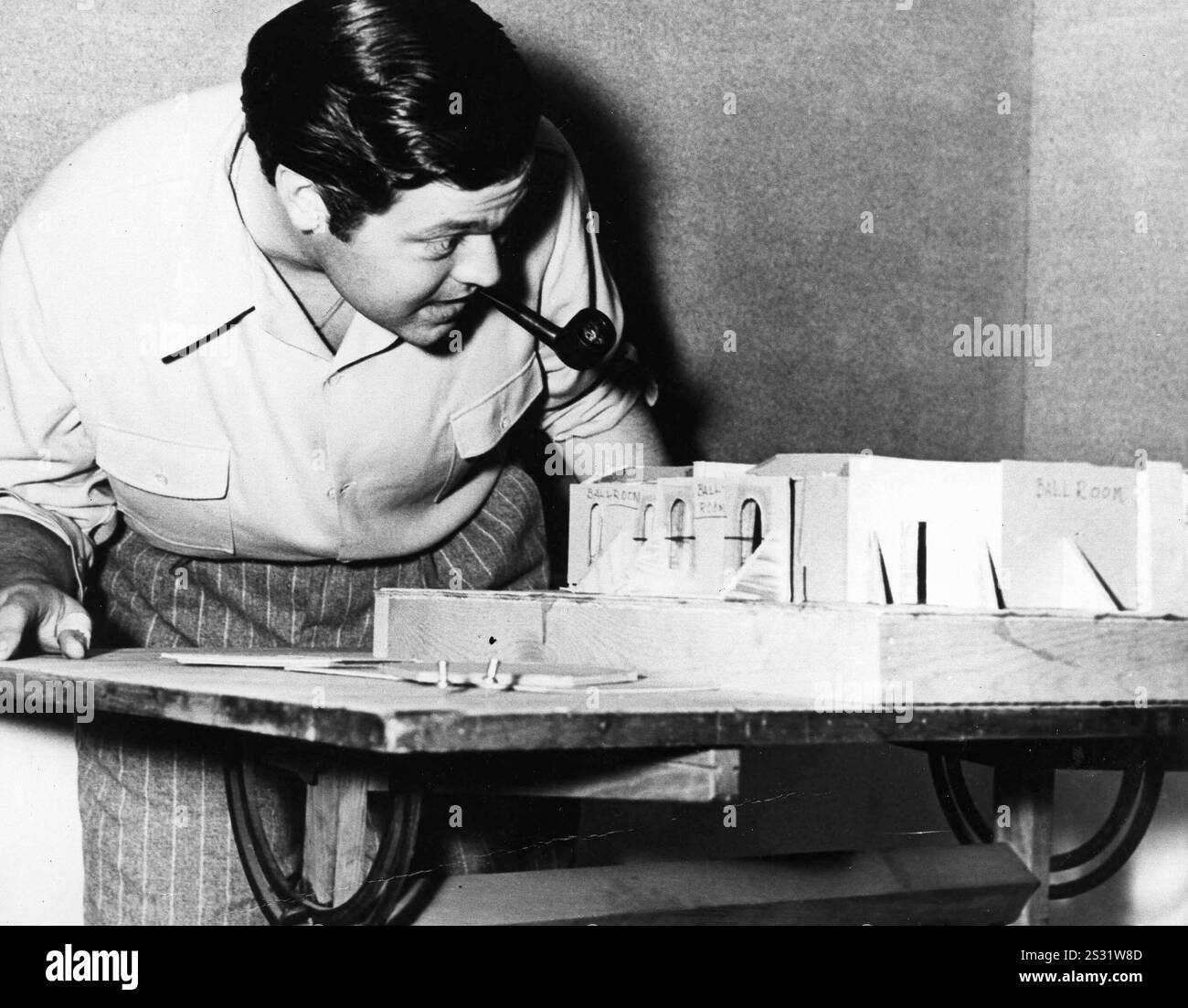 ORSON WELLES CHECKING THE SET MODELS FOR THE MAGNIFICENT AMBERSONS ...