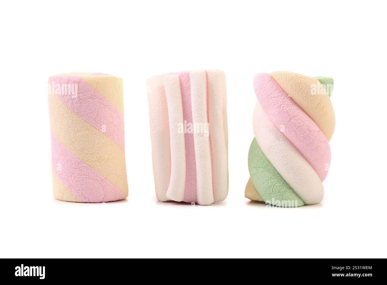 Three colourful marshmallow. Close up. White background Stock Photo - Alamy