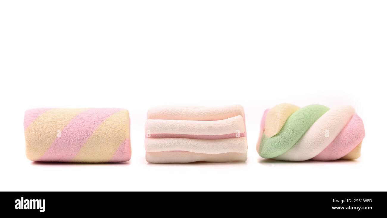 Three colourful marshmallow. Close up. White background Stock Photo - Alamy