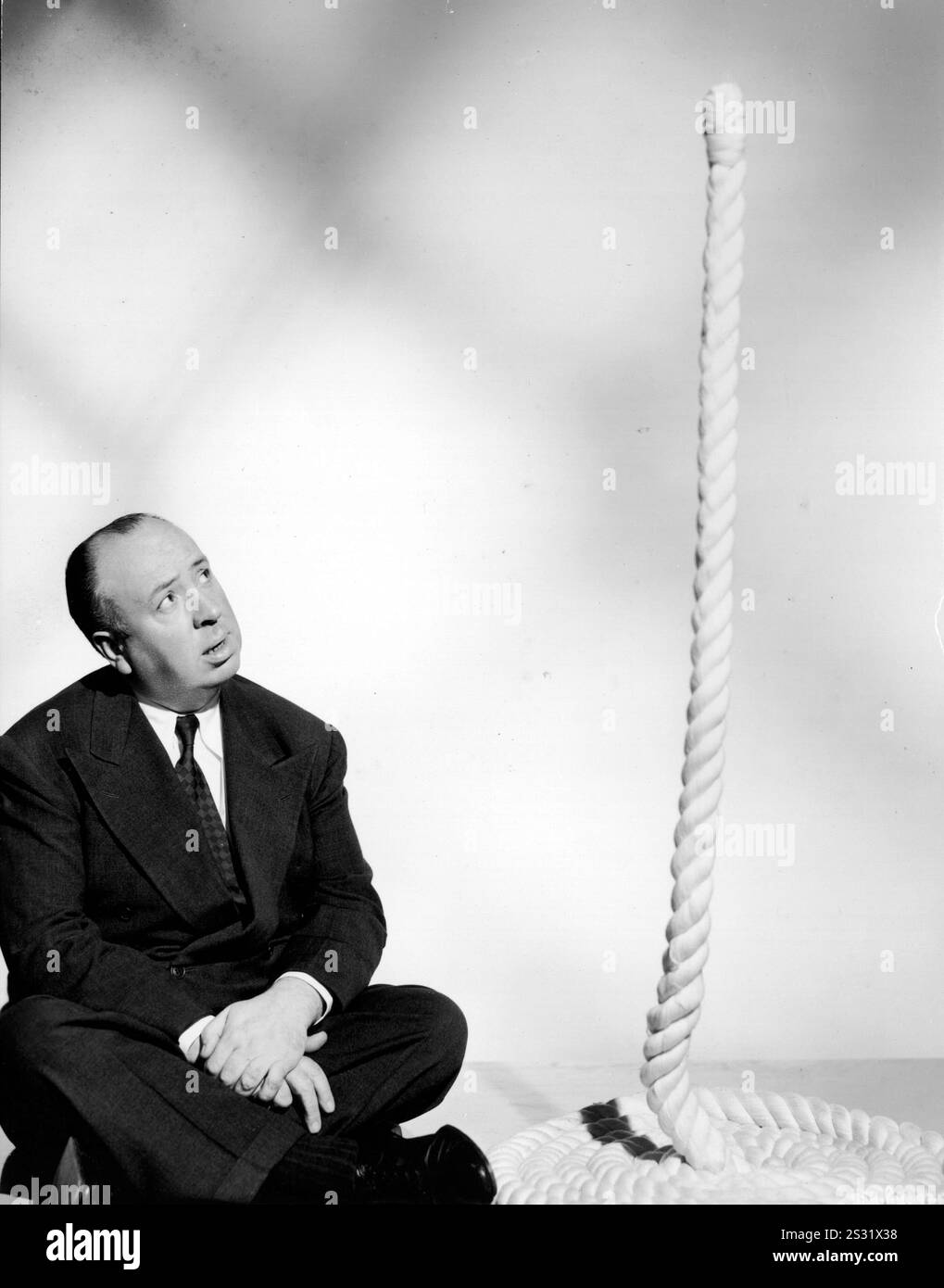 PUBLICITY PHOTO OF DIRECTOR ALFRED HITCHCOCK FOR HIS FILM ROPE Date ...