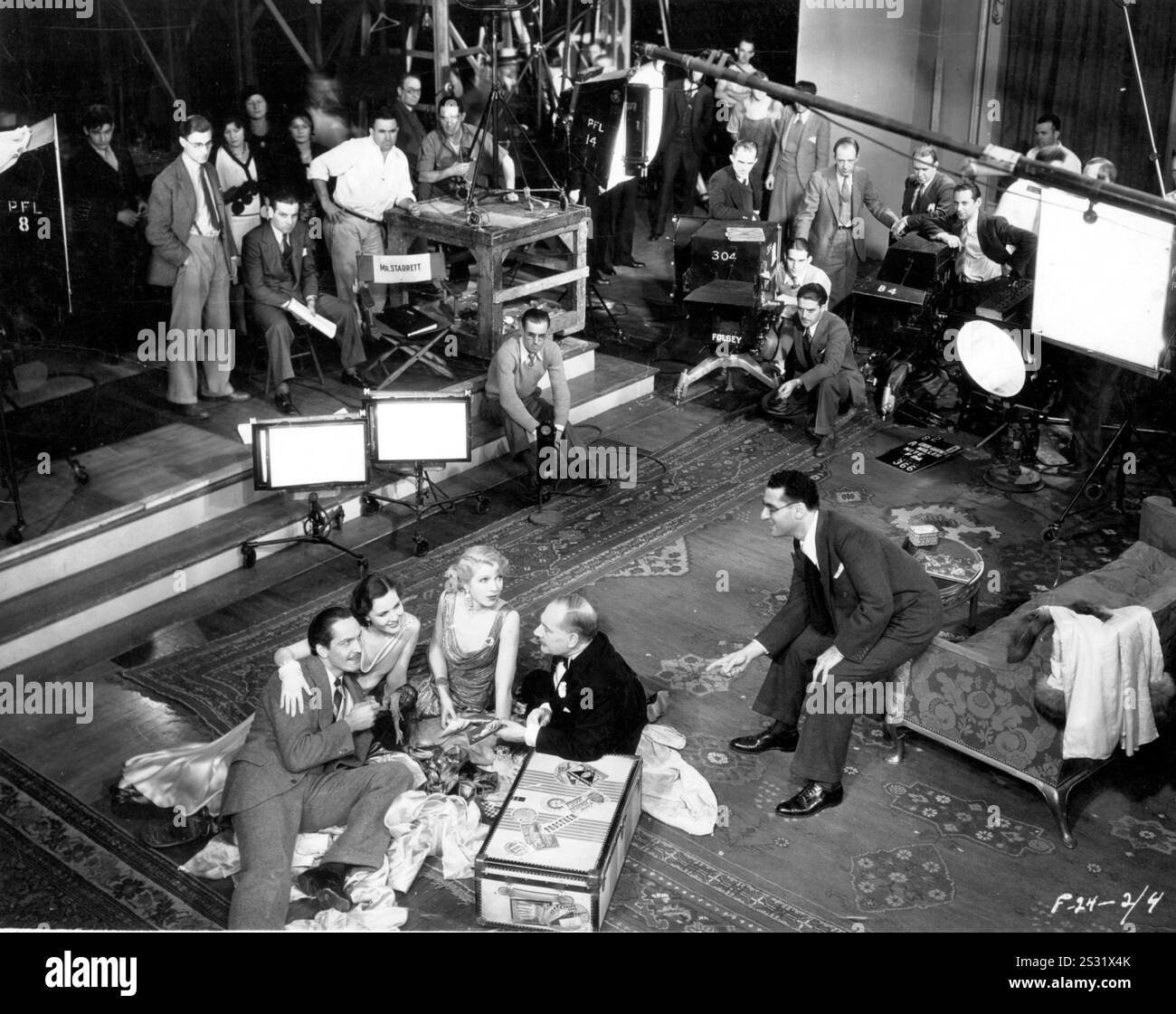 THE ROYAL FAMILY OF BROADWAY DIRECTOR GEORGE CUKOR ON THE SETTEE WITH ...
