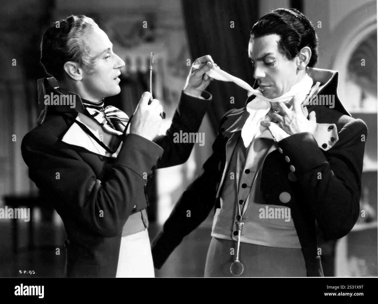 THE SCARLET PIMPERNEL LESLIE HOWARD, RAYMOND MASSEY Date: 1934 Stock ...