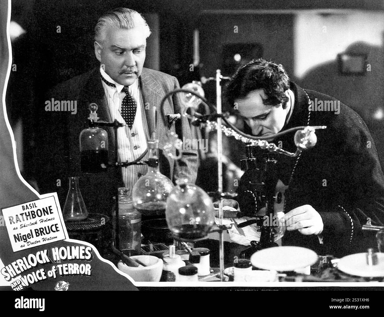 SHERLOCK HOLMES NIGEL BRUCE, BASIL RATHBONE Date: 1939 Stock Photo - Alamy
