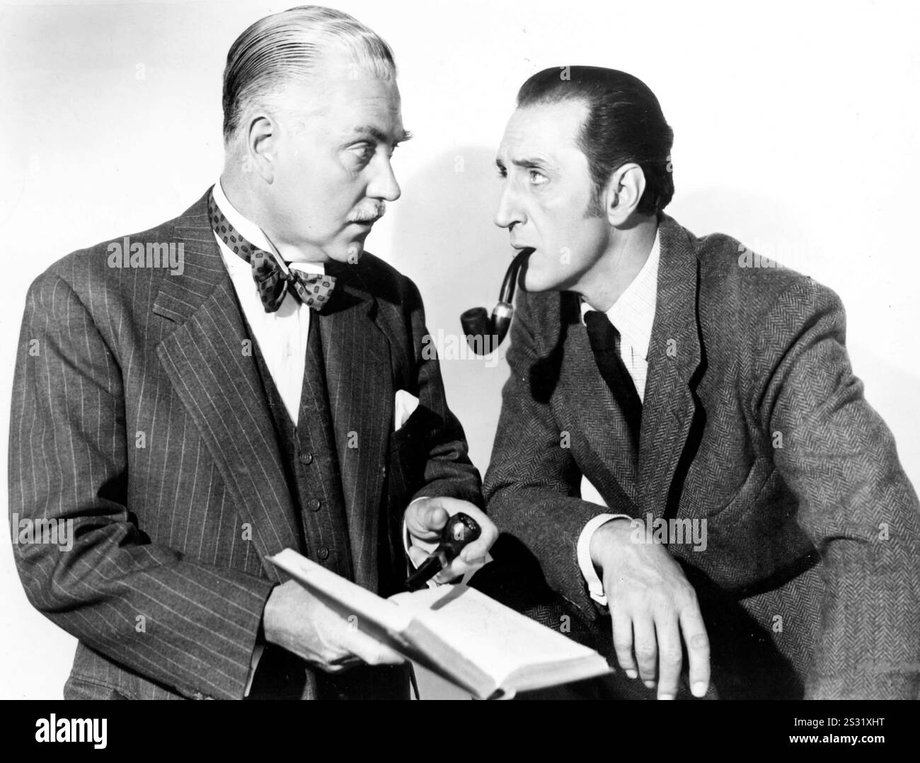 SHERLOCK HOLMES NIGEL BRUCE, BASIL RATHBONE Date: 1939 Stock Photo - Alamy