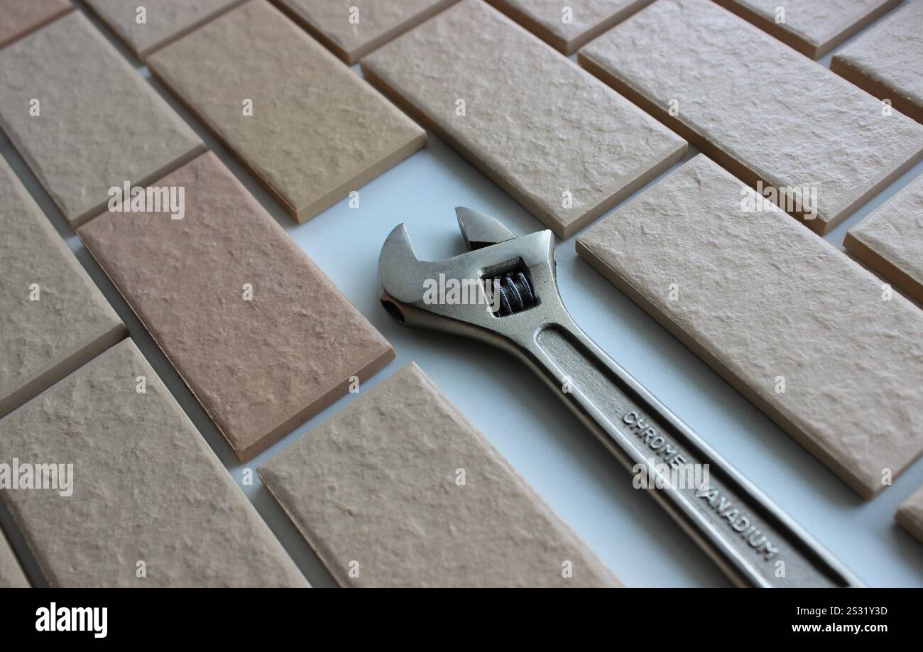 Head Of Adjustable Spanner Inside Decorative Brickwork. Stock Photo For ...