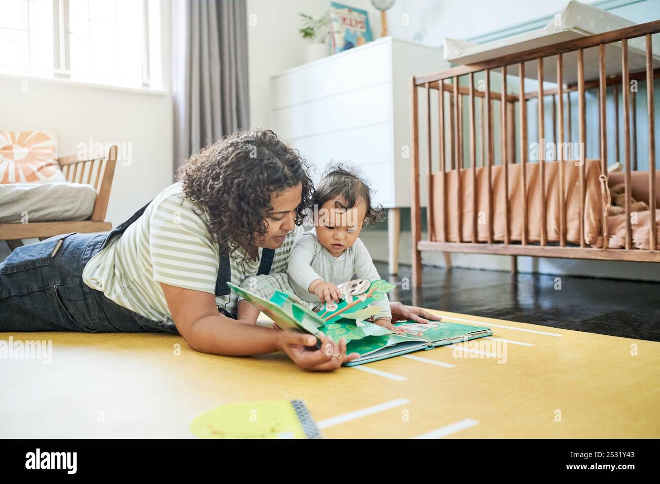 Mother, baby and reading book for learning in home, storytelling and ...