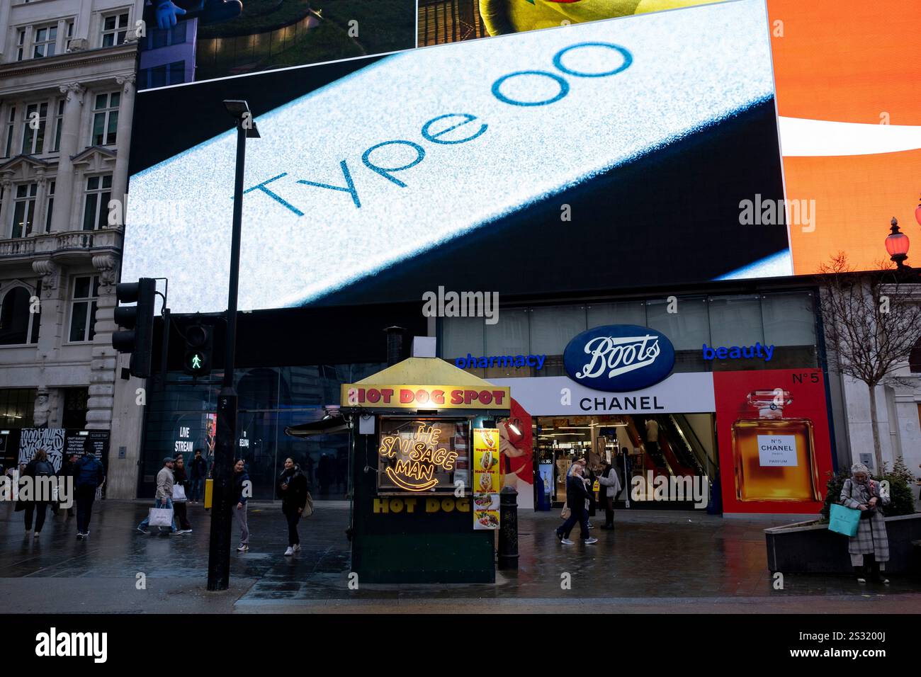 Digital advertising screens at Piccadilly Circus show an advert for the ...