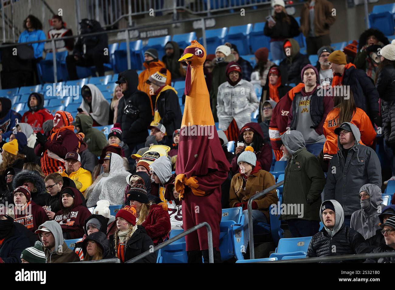 CHARLOTTE, NC - JANUARY 03: A fan dressed as a Virginia Tech mascot ...