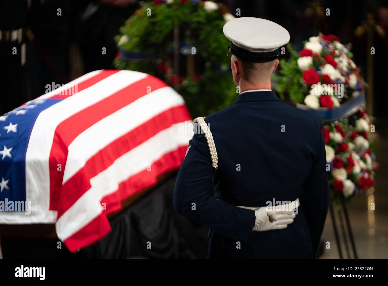 Washington, District Of Columbia, USA. 7th Jan, 2025. An honor guard stands watch over former ...