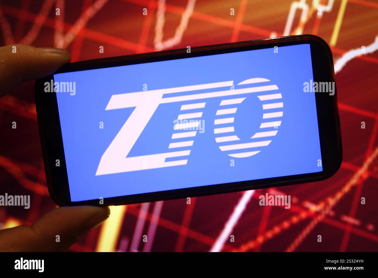 In this photo illustration, the ZTO Express company logo is seen ...